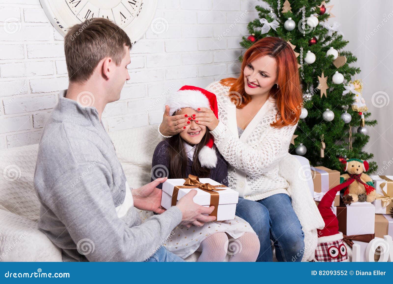 Parents Surprise Their Daughter with Gift Box Stock Photo - Image of ...