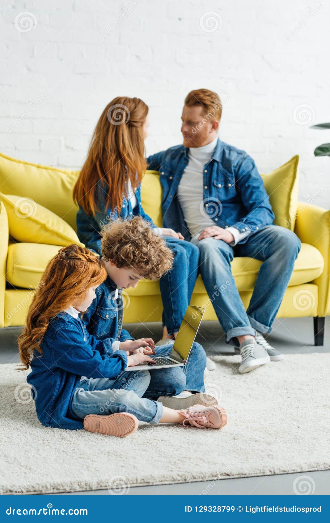 Parents talking while kids stock image. Image of handsome - 129328799