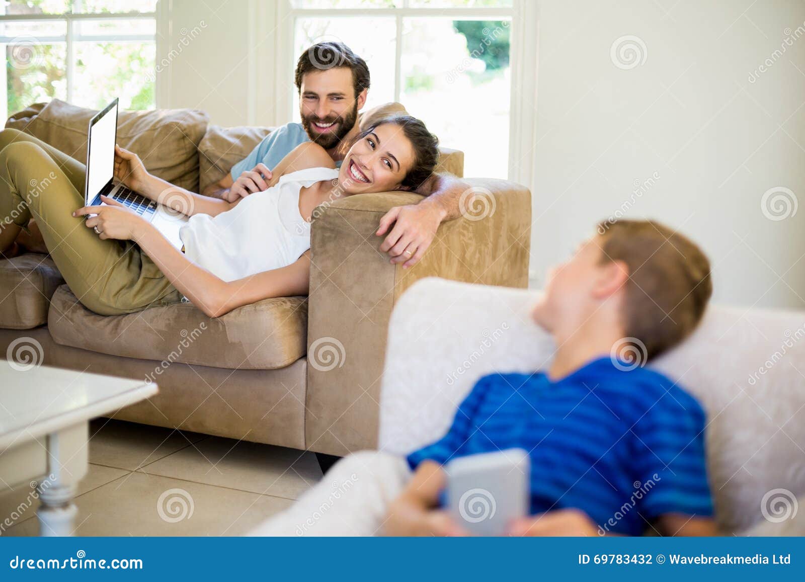 Parents Talking To a Son while Using Laptop Stock Photo - Image of ...