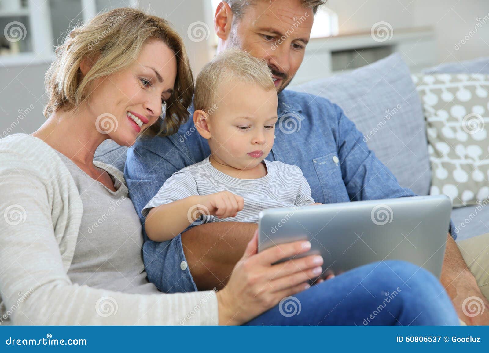 Parents with Their Child Using Tablet Stock Image - Image of digital ...