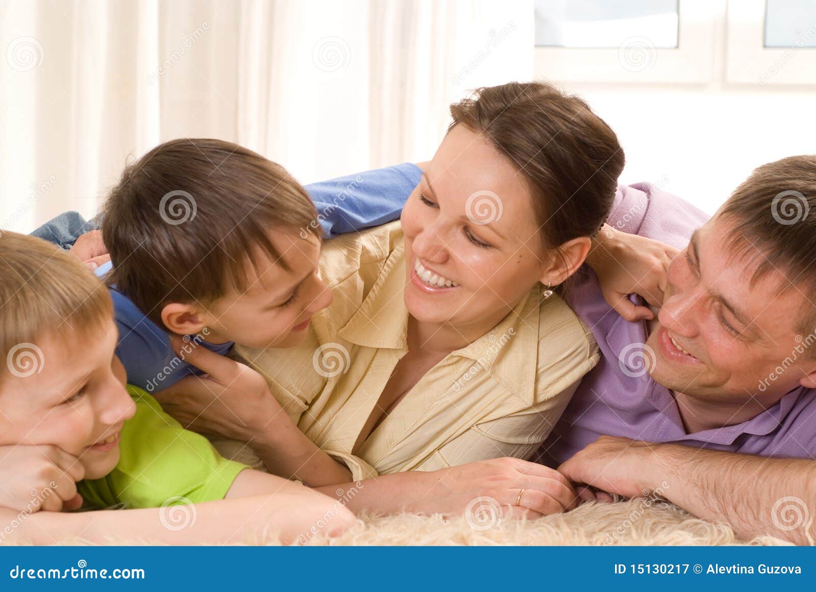 Parents with Their Two Children Stock Image - Image of nice, game: 15130217
