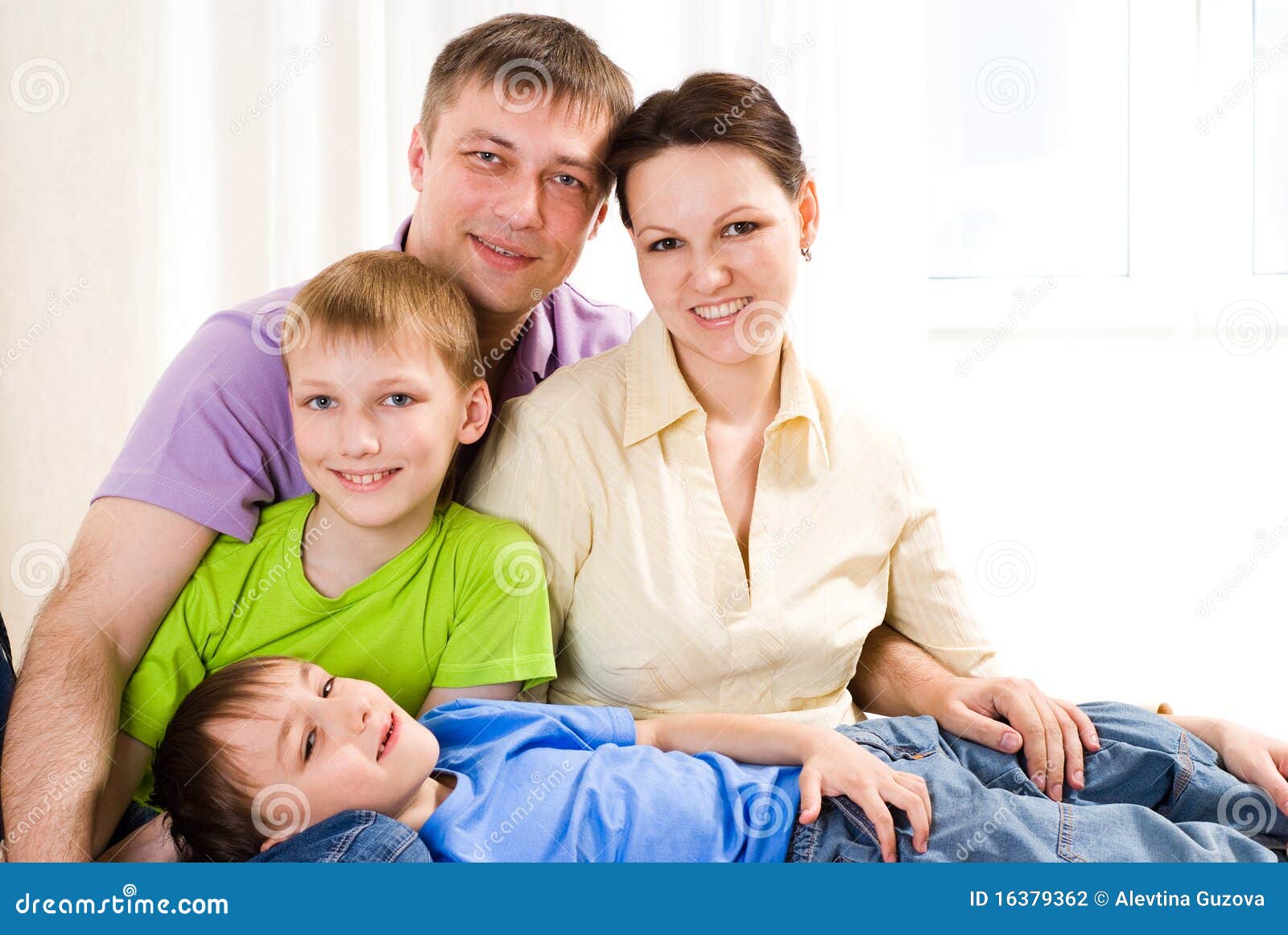 Parents with Their Two Children Stock Photo - Image of boys, people ...