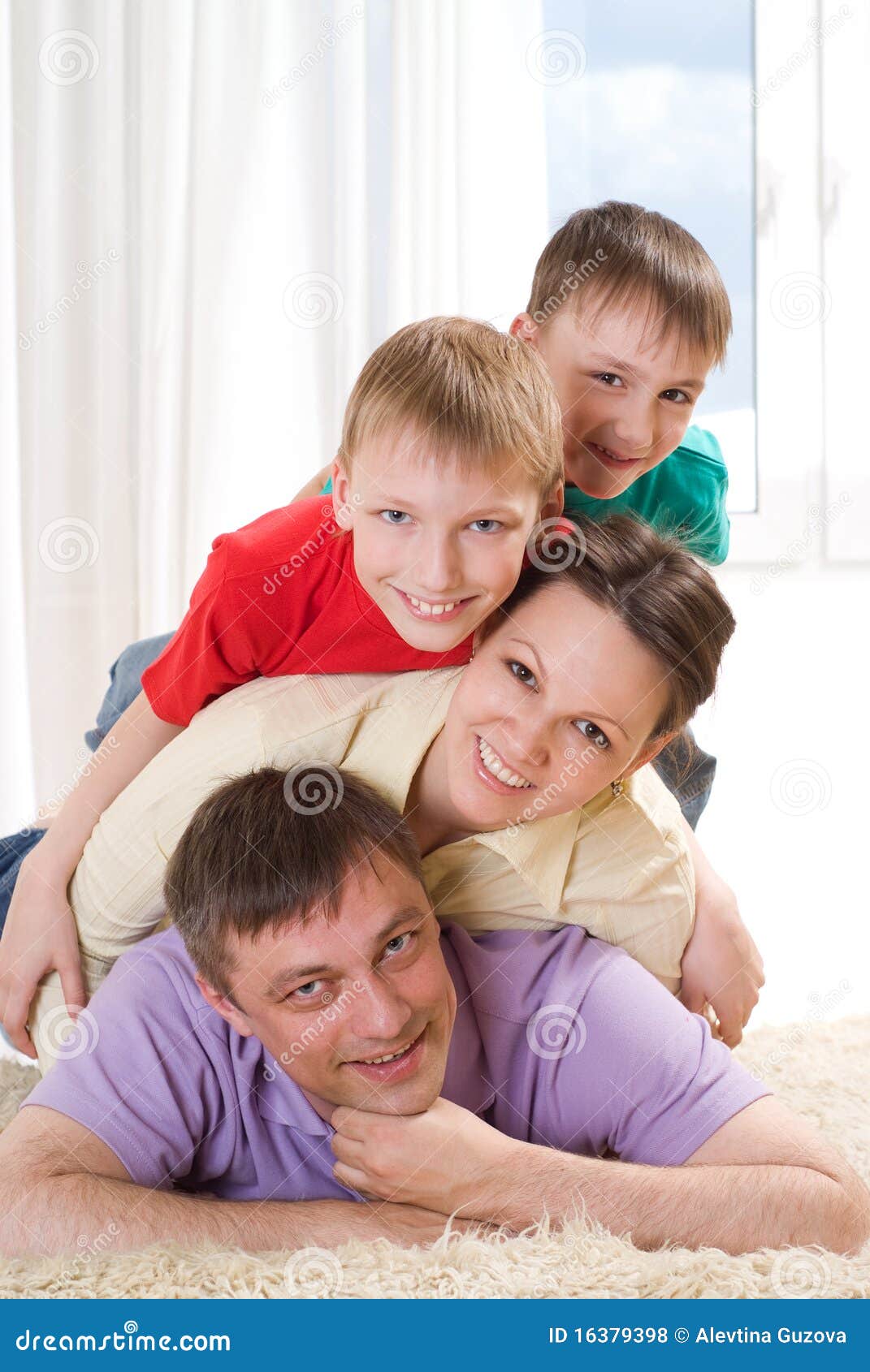 Parents with Their Two Children Stock Photo - Image of couple, emotions ...