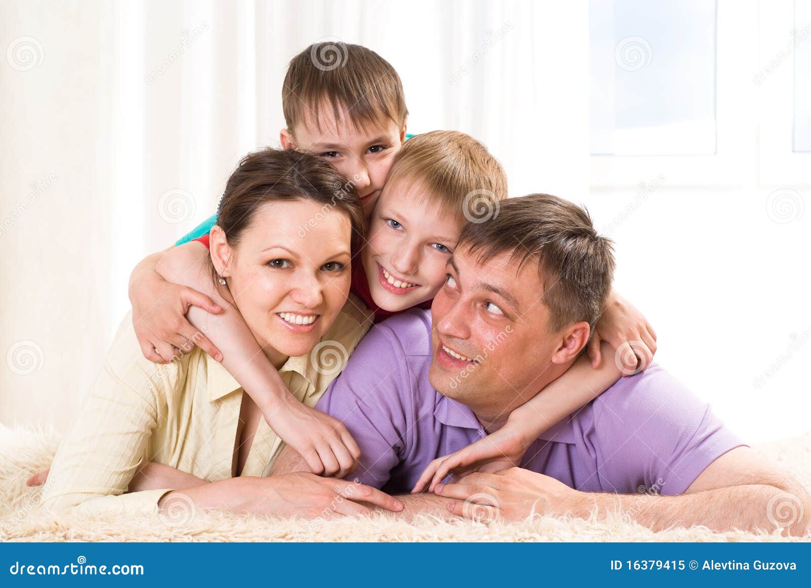 Parents with Their Two Children Stock Image - Image of family, home ...
