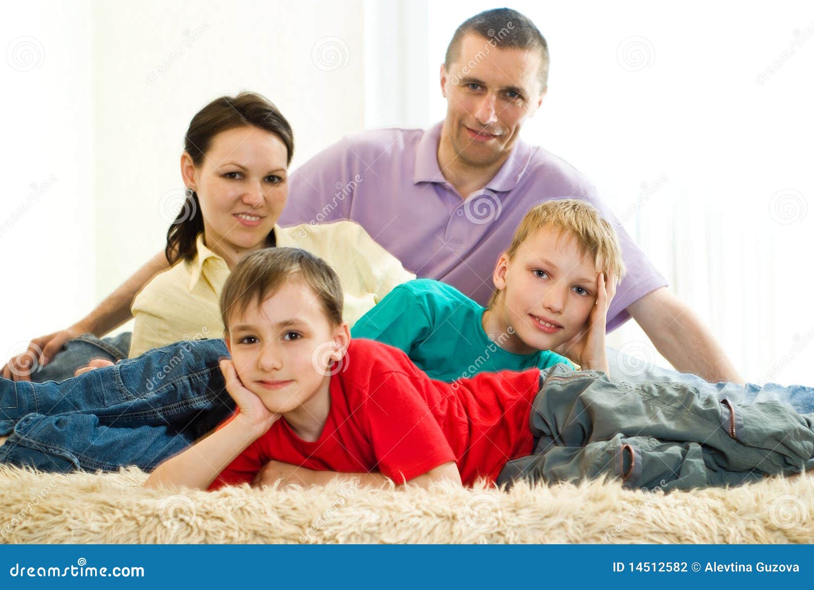 Parents with two children stock photo. Image of children - 14512582