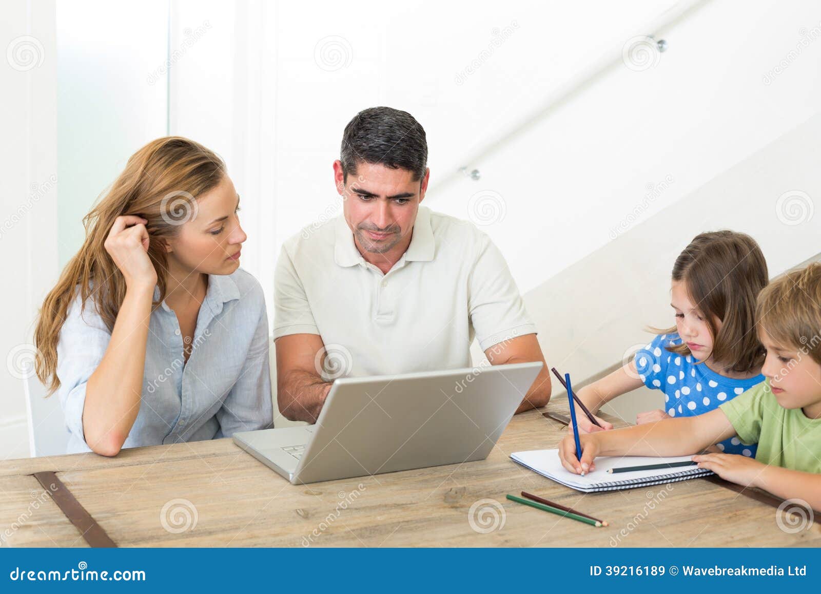 Parents Using Laptop while Children Coloring Stock Image - Image of ...