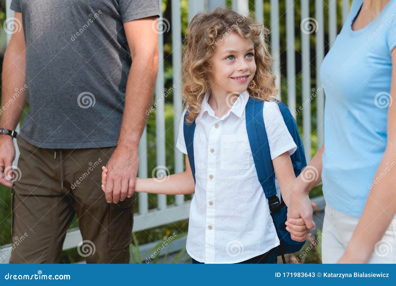 Parents walking to school stock image. Image of safety - 171983643