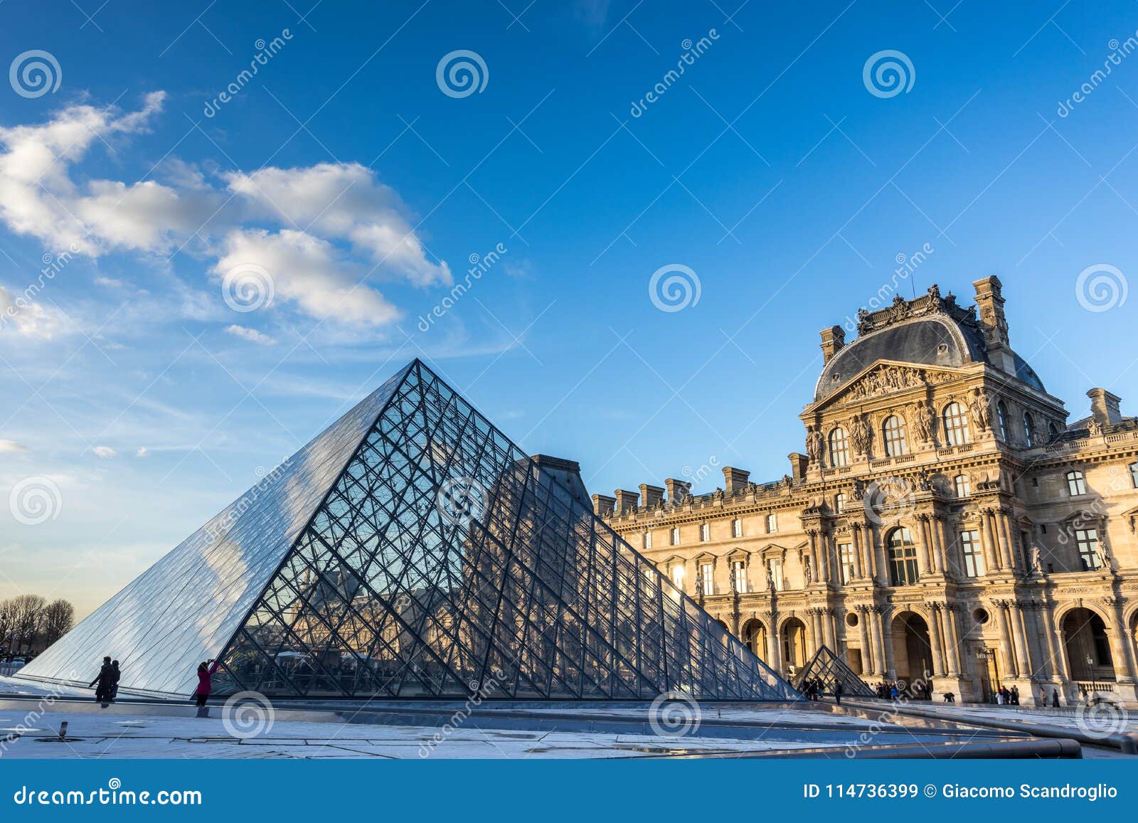 PARIS, FRANCE. Feb 2018: Louvre Museum View at Sunset, with the ... PARIS, FRANCE. Feb 2018: Louvre Museum View at Sunset, with the ...