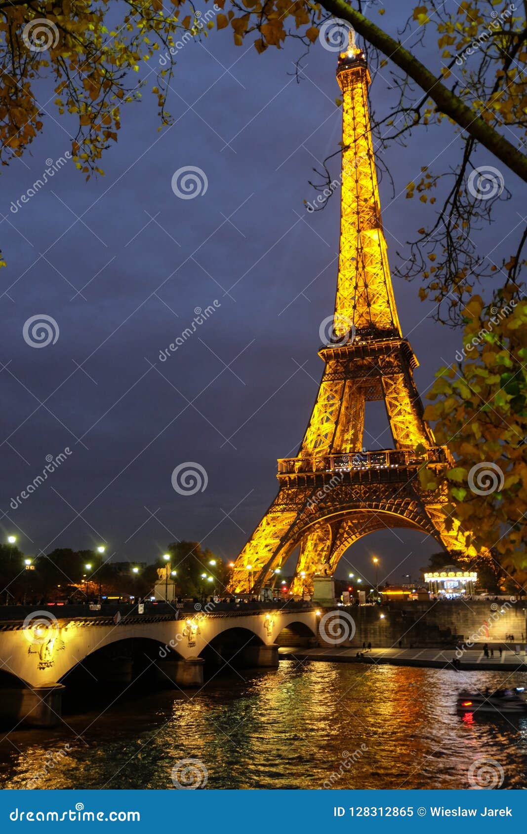Eiffel Tower Illuminated at Dusk. the Eiffel Tower is One of the Most ... Eiffel Tower Illuminated at Dusk. the Eiffel Tower is One of the Most ...