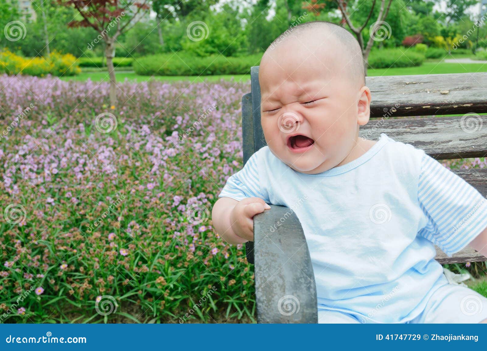 A park bench crying child stock image. Image of china - 41747729