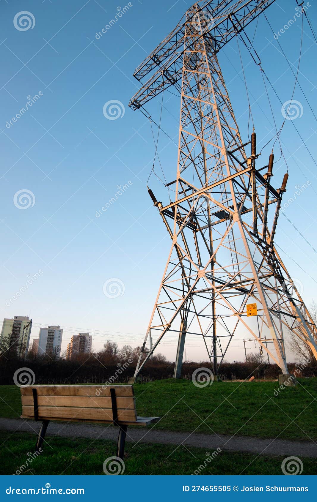 Park Bench Opposite an Electricity Pylon Stock Image - Image of ...