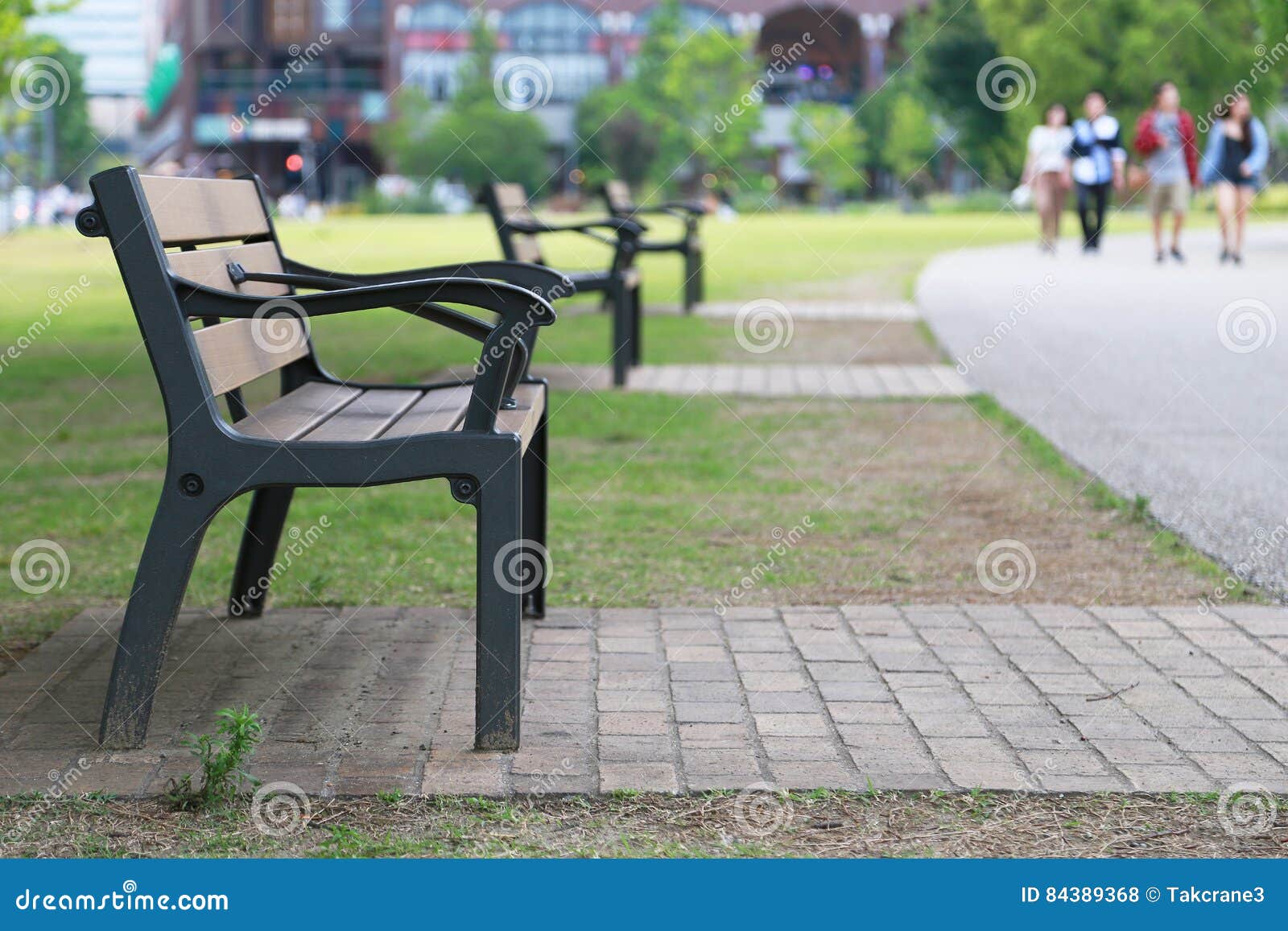 Park bench and pedestrian stock photo. Image of outdoor - 84389368