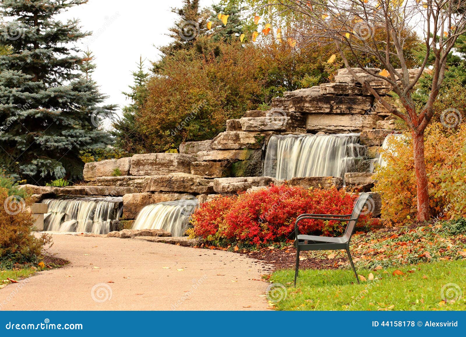 Park Bench And Waterfall Stock Photography | CartoonDealer.com #44158178