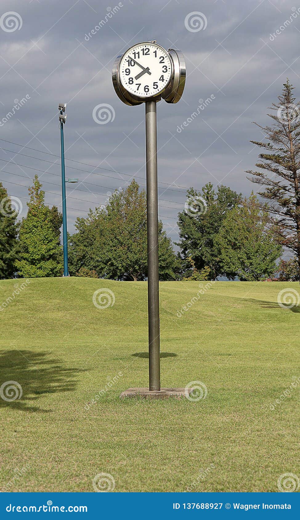 The clock in the park stock image. Image of grass, relax - 137688927