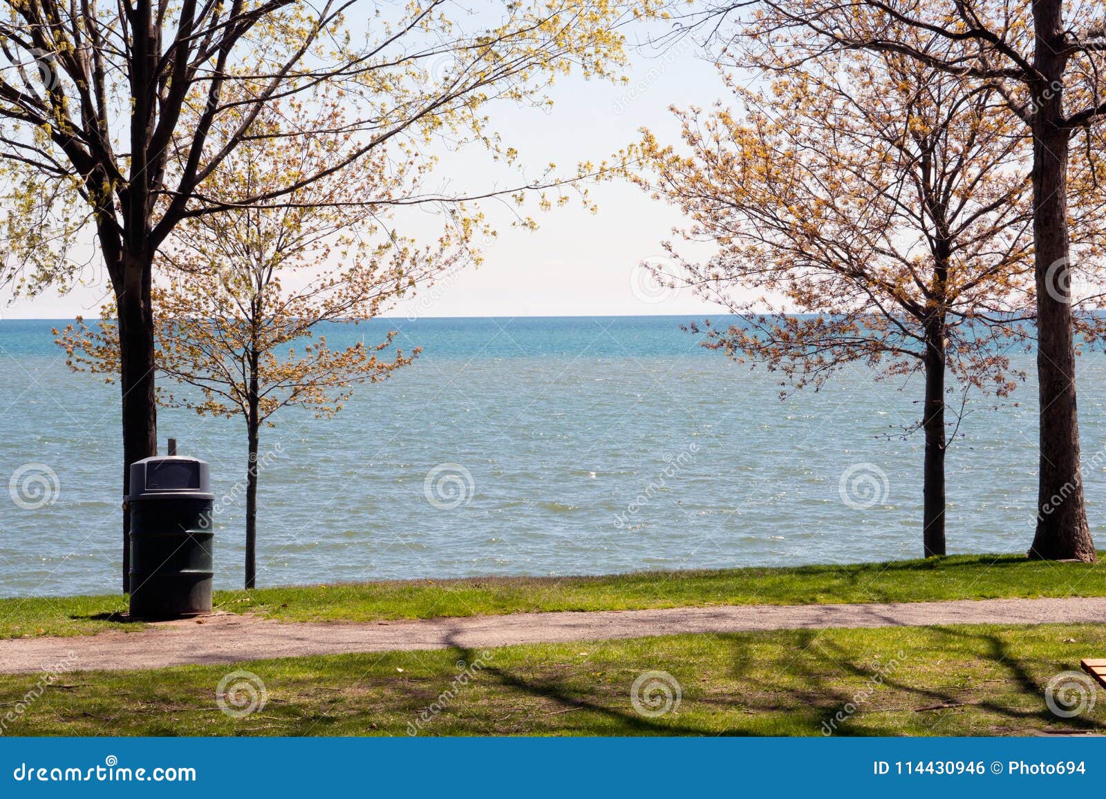 Park by Large Lake with Garbage Bin Stock Photo - Image of sunny, dump ...