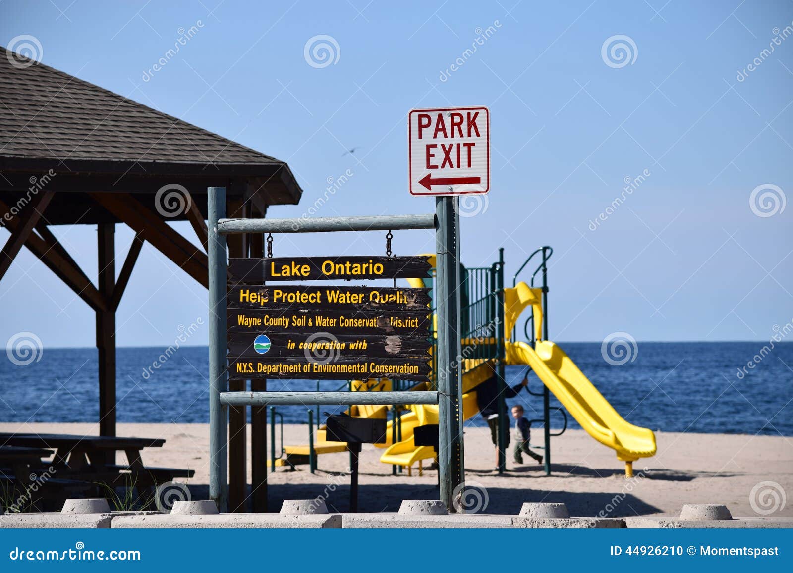 Keep it Clean and Park Exit Signs at Sodus Point Bay Stock Photo ...