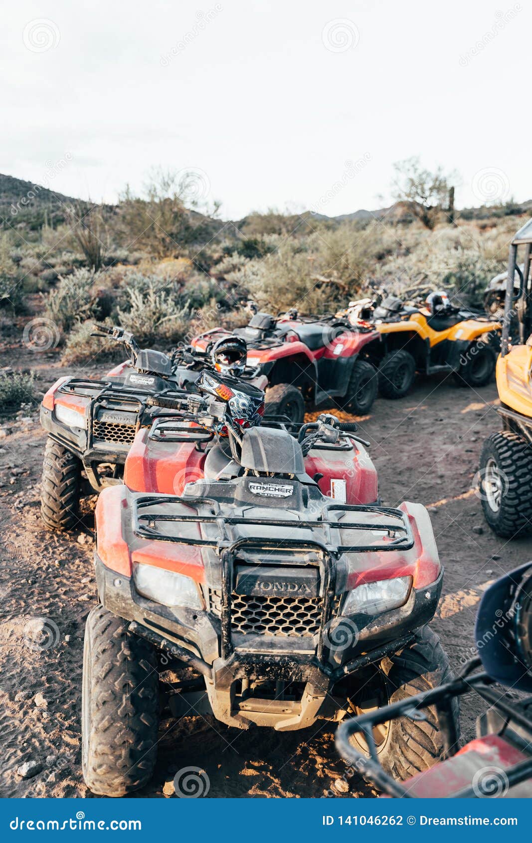 Parked ATVs in Desert editorial photography. Image of atvs - 141046262