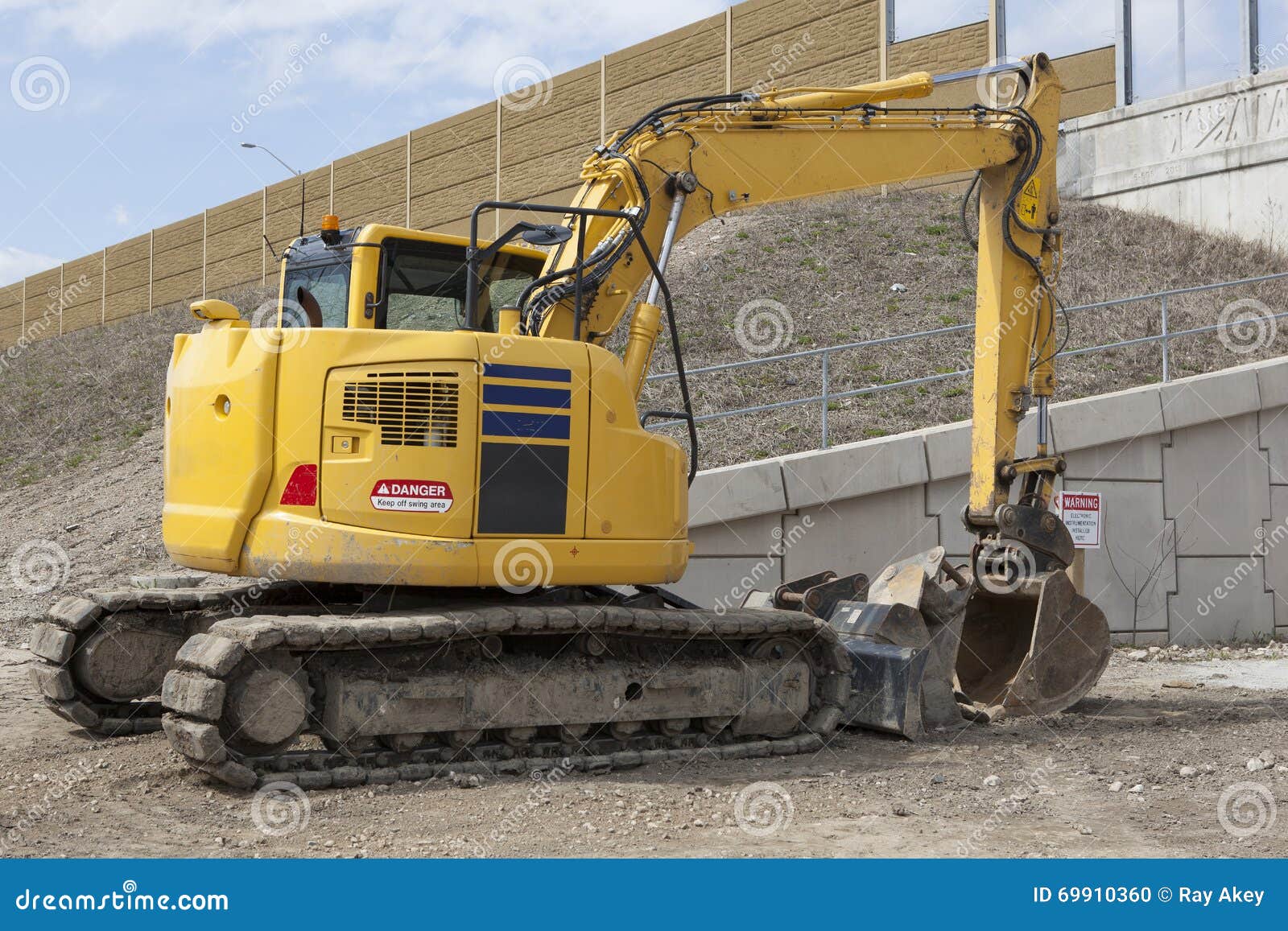 Parked Backhoe at Construction Site Stock Photo - Image of bucket ...