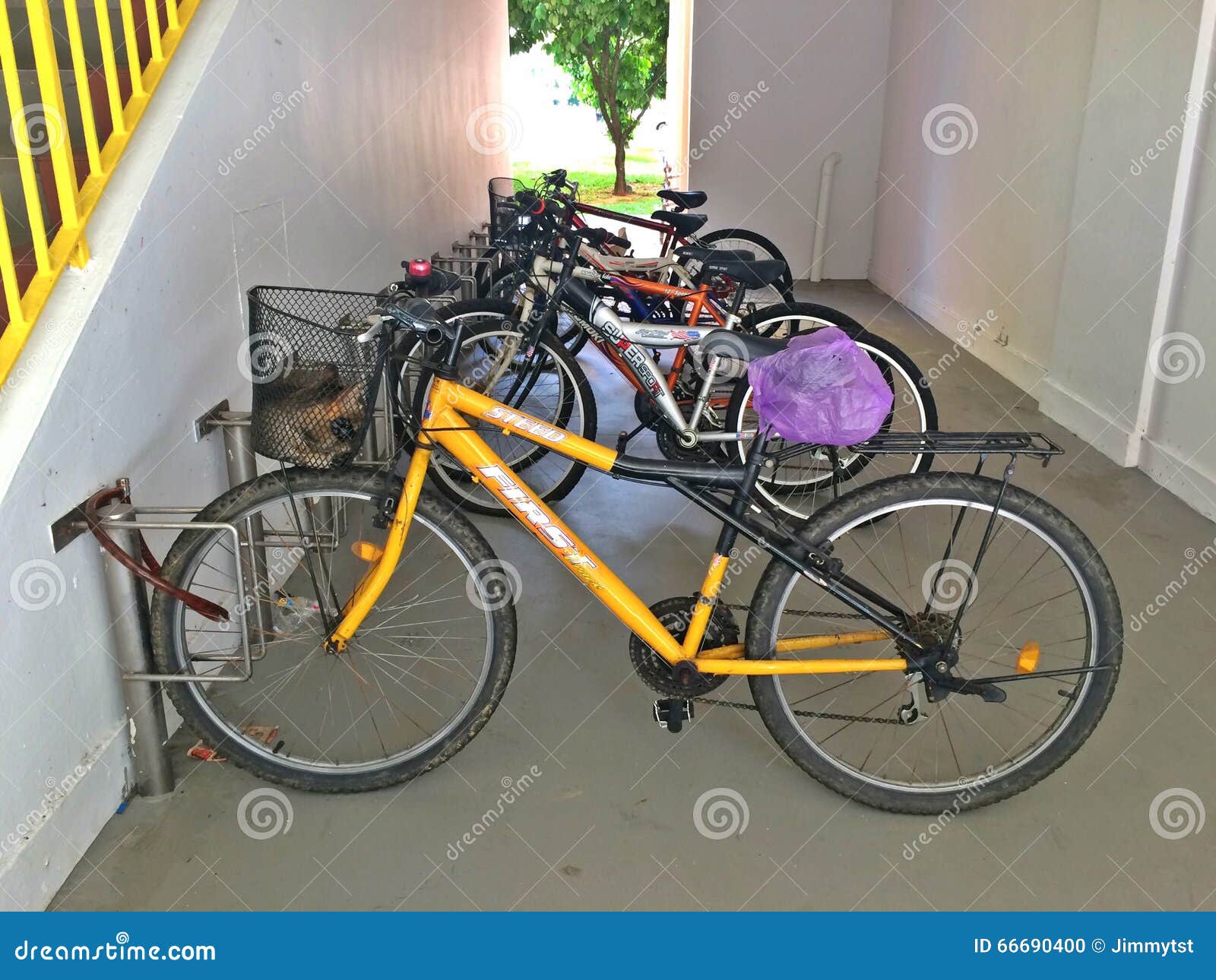 Parked bicycles editorial image. Image of bicycles, flat - 66690400
