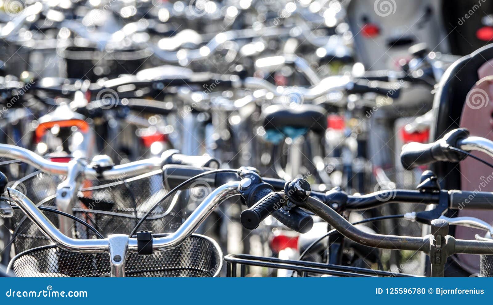 Parked Bikes on a Huge Bicycle Parking Lot Stock Photo - Image of ...