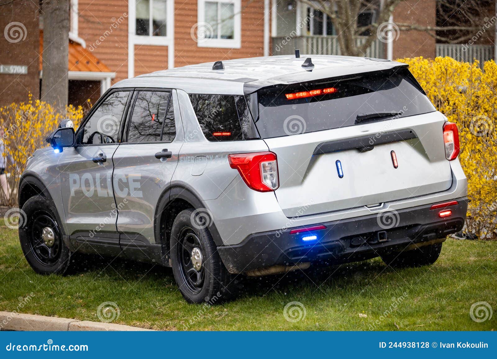 Parked Police Car with Emergency Lights Illuminated Stock Photo - Image ...