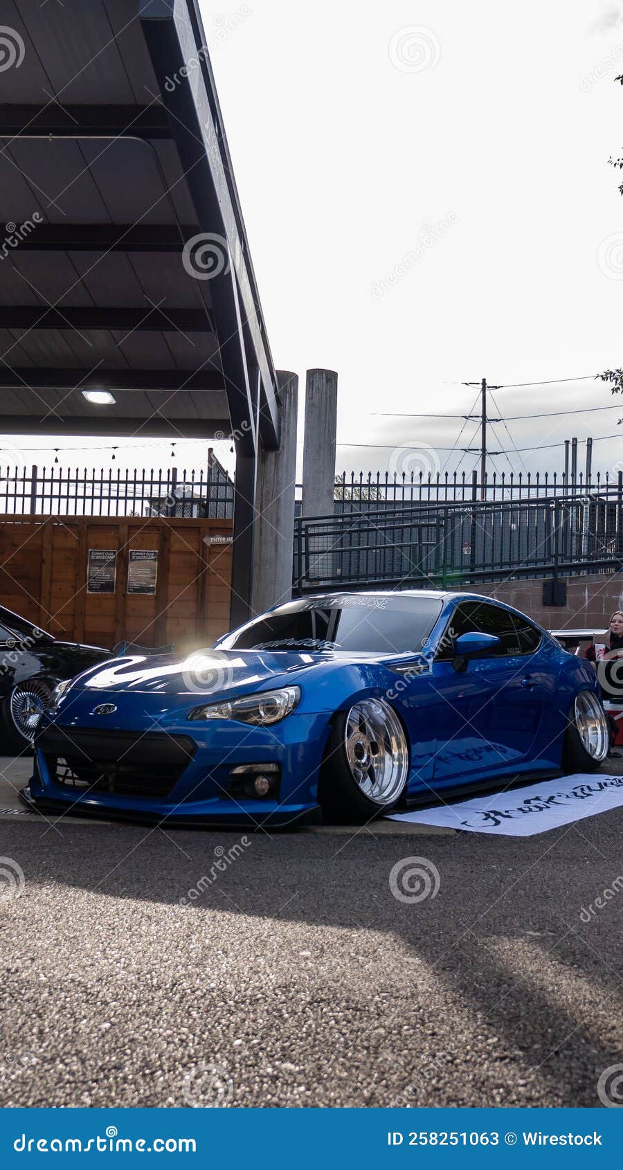 The Blue Subaru Impreza Stands In Which Garage And Wears Yellow ...