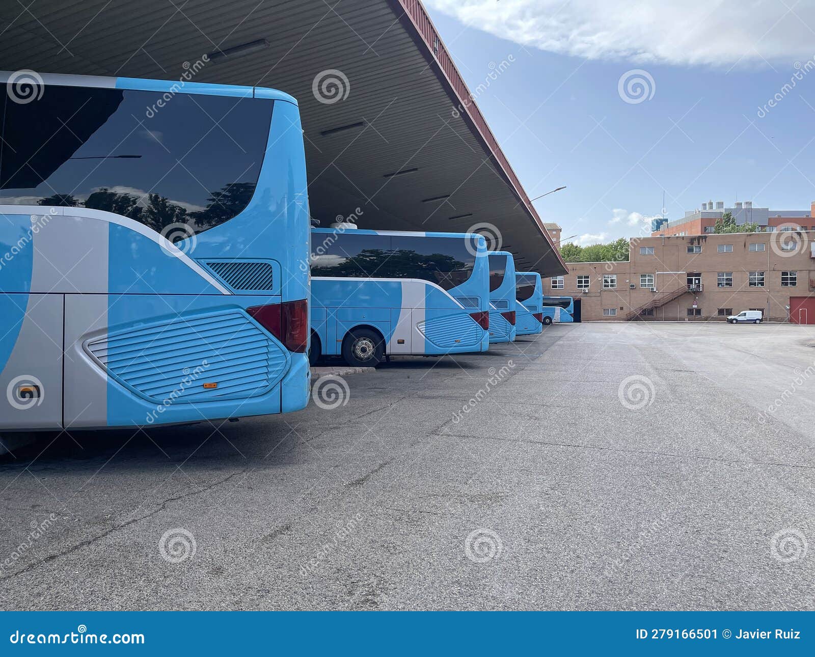 Buses Are Parked Along The Roadside Under The Shady Trees. Clean Street ...