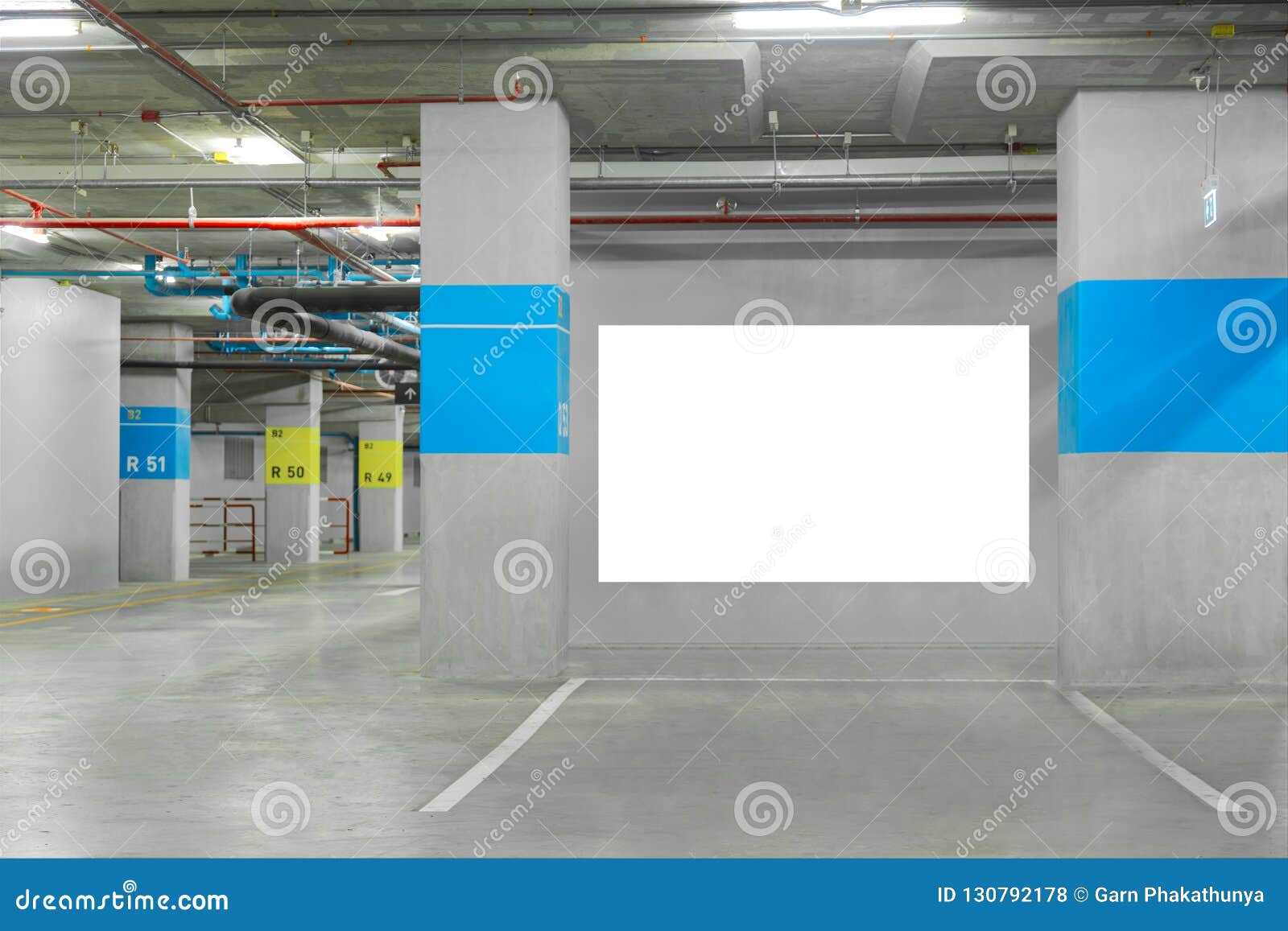 Parking Garage Underground Interior with Blank Billboard. Stock Photo ...