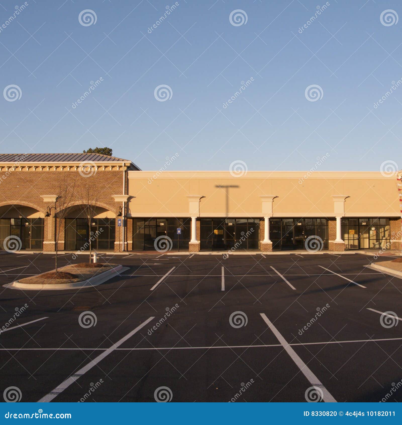 Parking lot and shops stock photo. Image of modern, vacant - 8330820