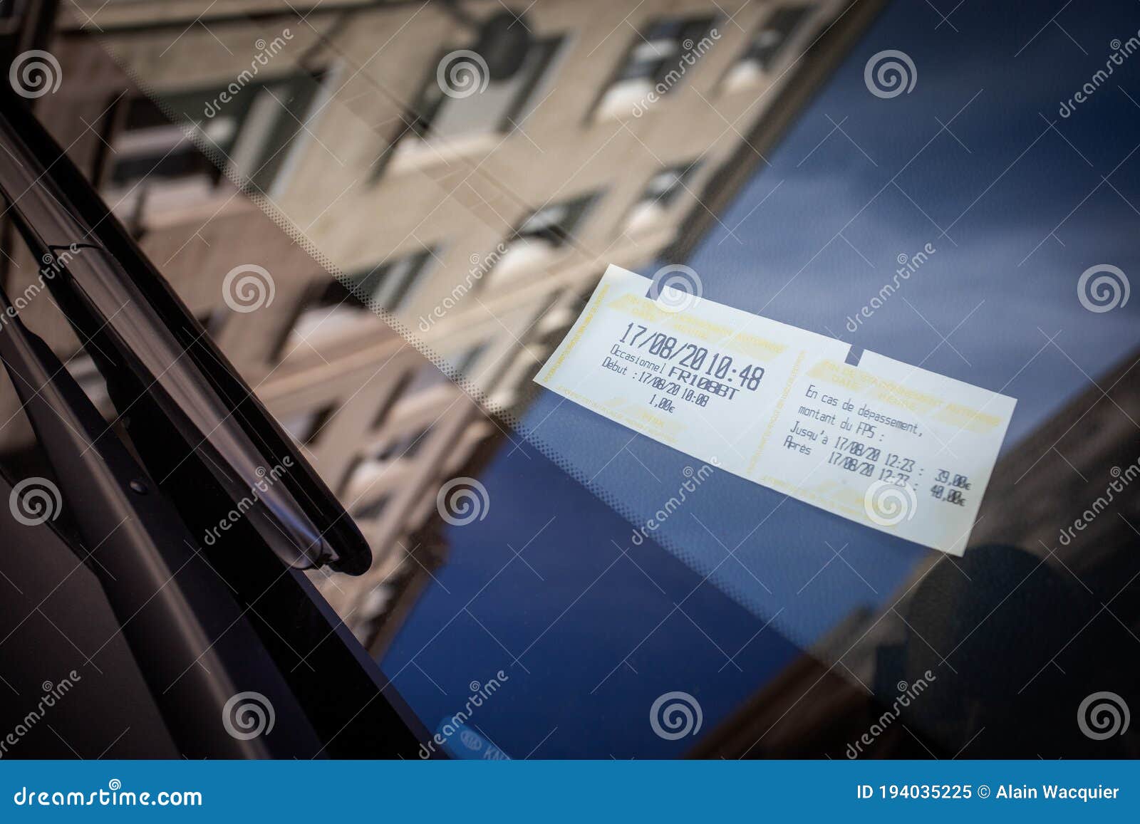 Parking Meter Ticket Placed in the Passenger Compartment of a Car Stock ...