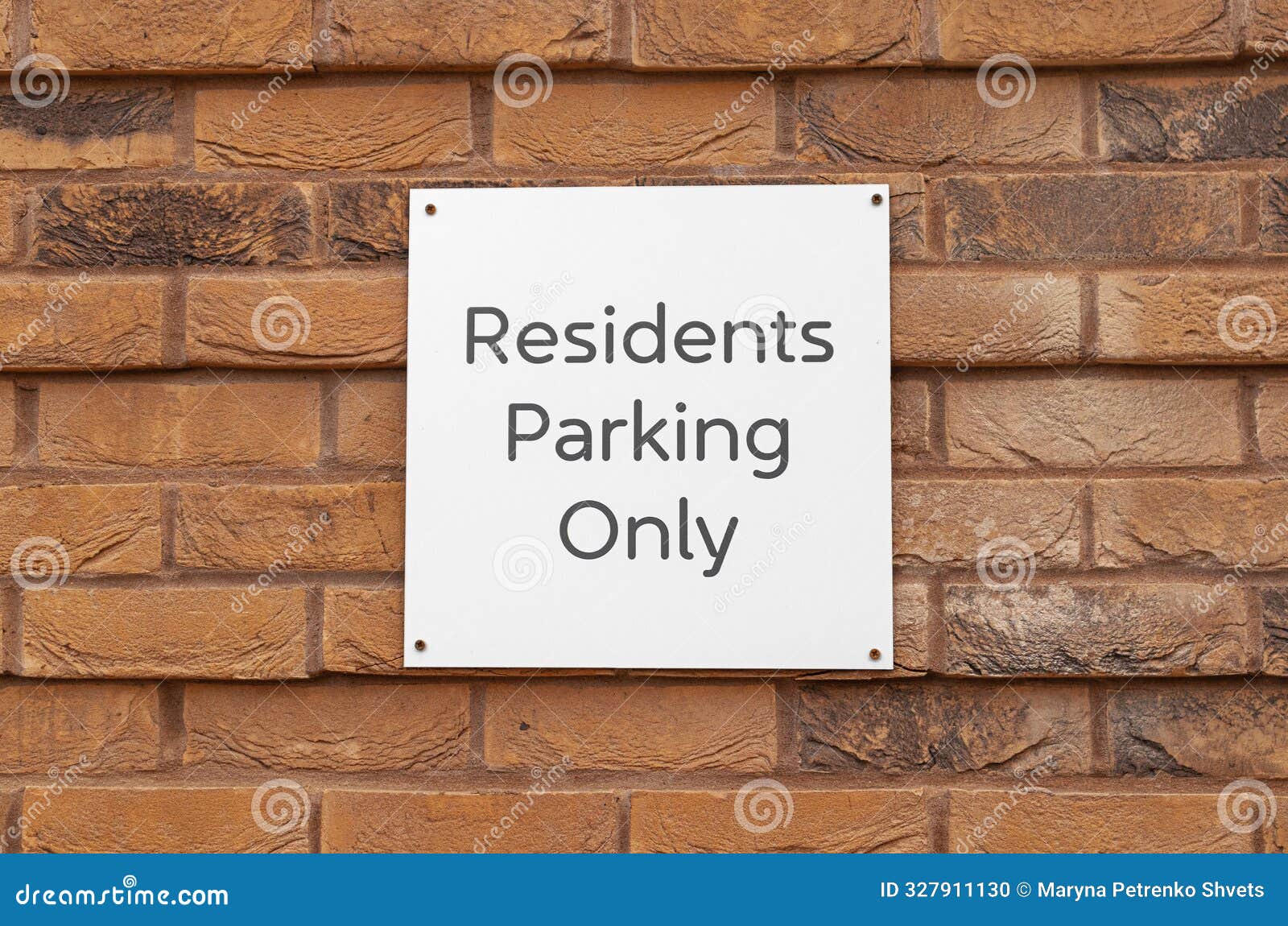 Parking for Residents only Sign on Red Brick Wall Stock Photo - Image ...