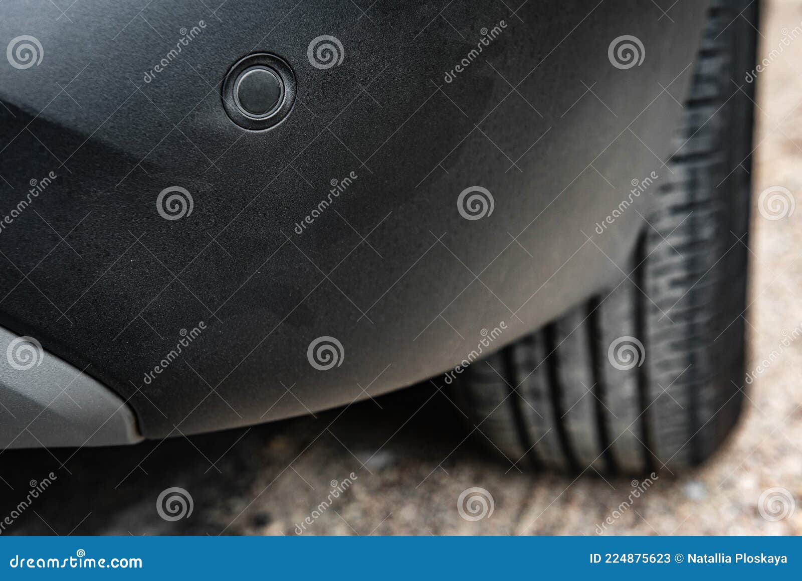 Parking Sensors On A White Car, Rear Bumper With Reflector And Exhaust ...