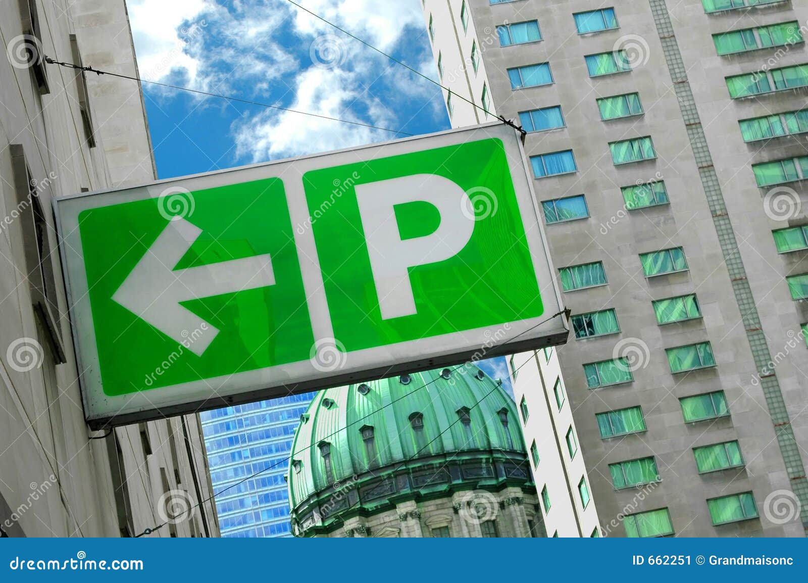 Parking sign in downtown stock image. Image of showing - 662251