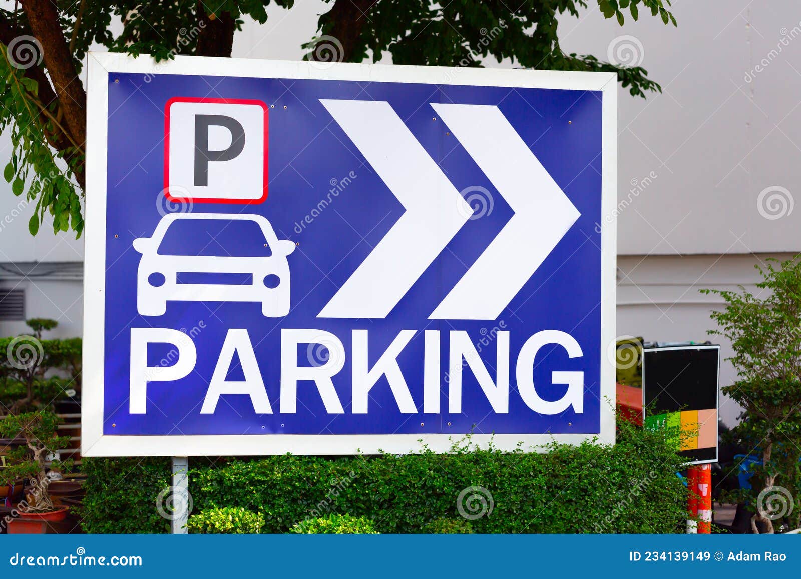 Parking Sign in Front of a Department Store Stock Image - Image of ...
