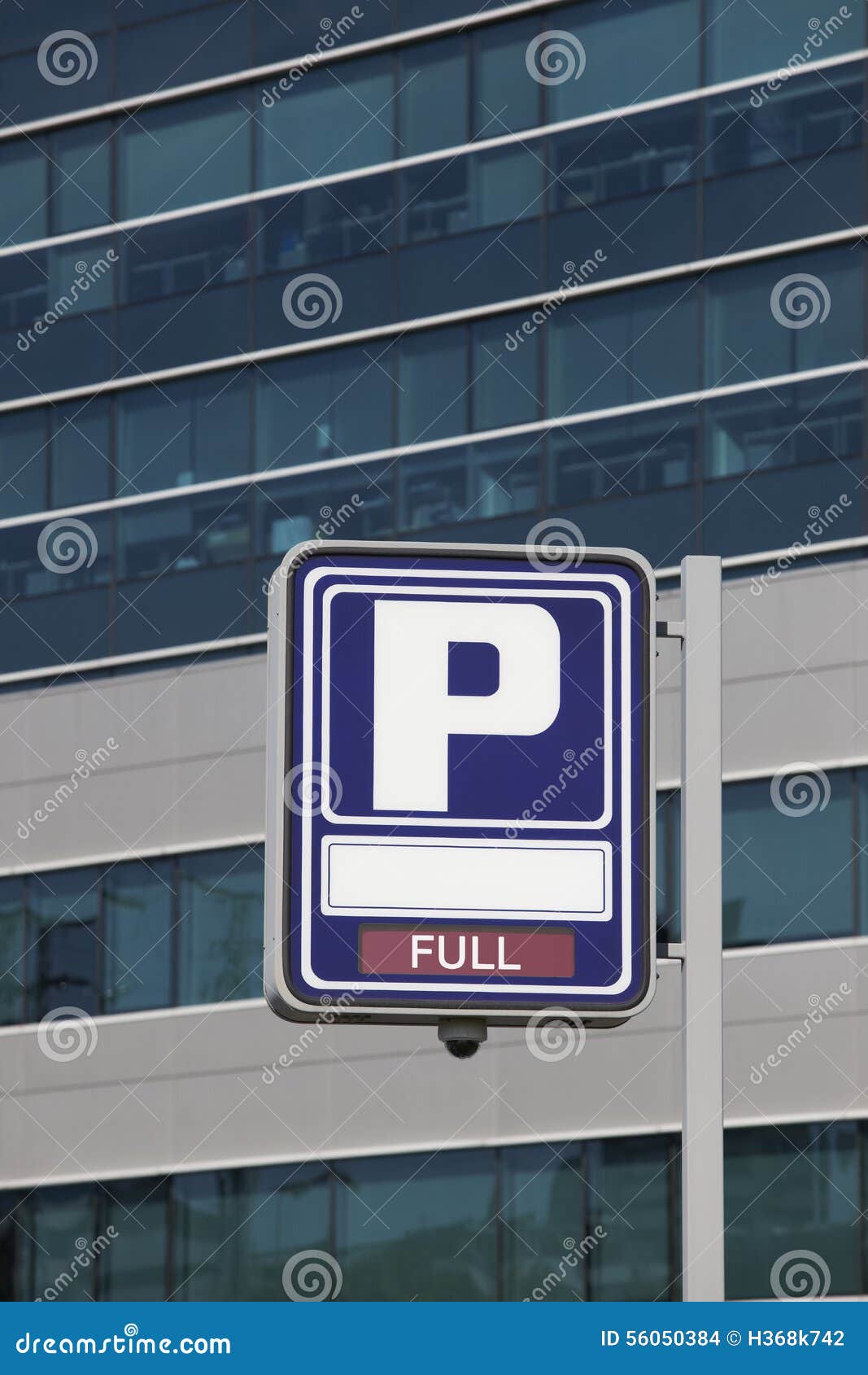Parking Signpost with Full Text and Modern Building Background Stock ...