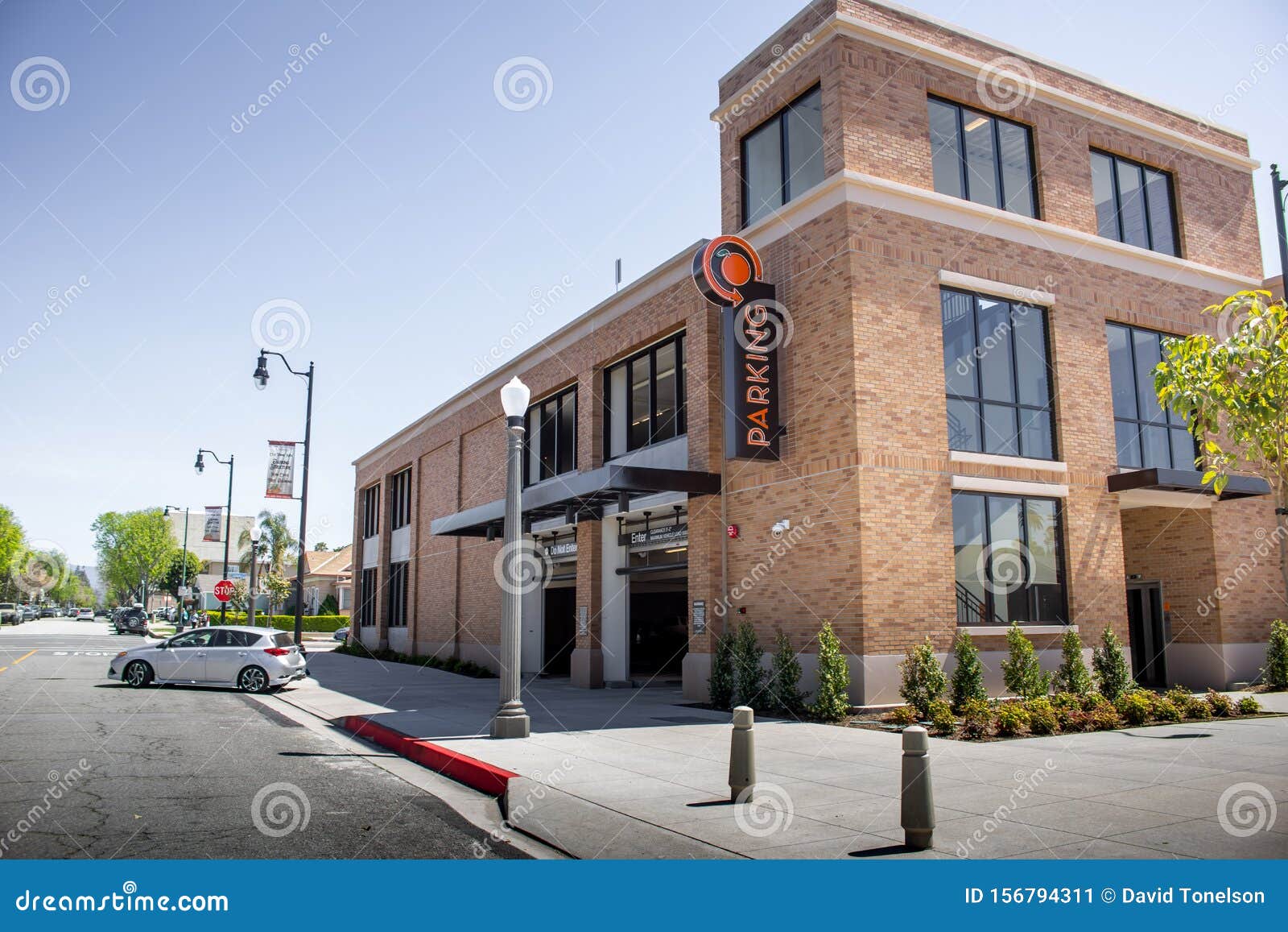 Parking Structure in Orange Editorial Photo - Image of banner, building ...