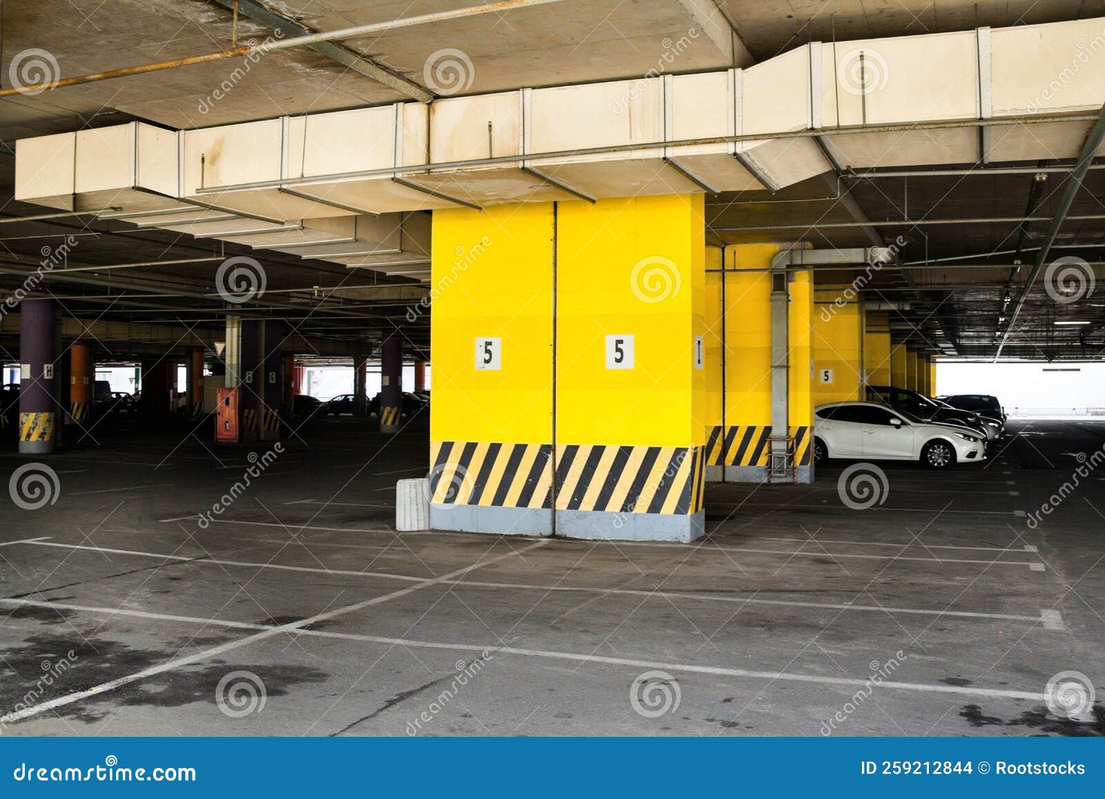 Parking under the building stock photo. Image of signal - 259212844