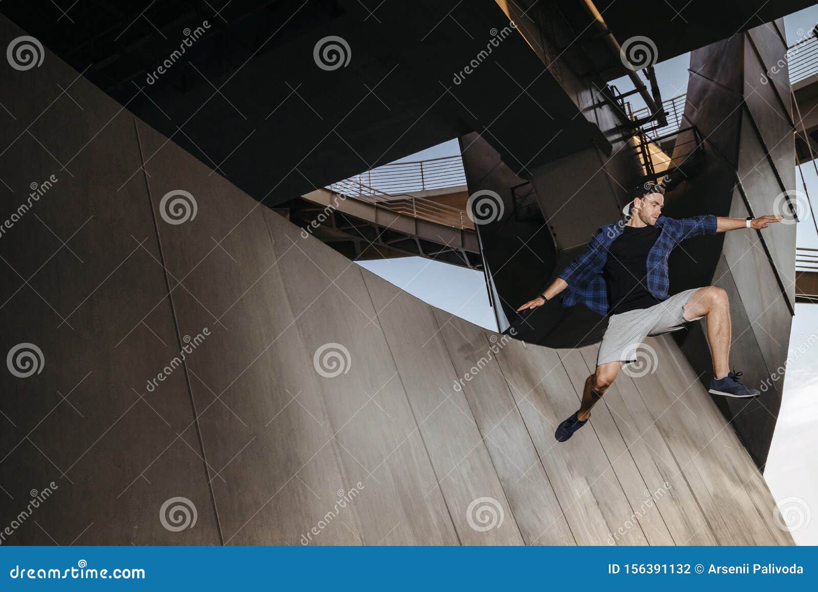Parkour Athlete Jumping from the Wall and Flying Stock Photo - Image of ...