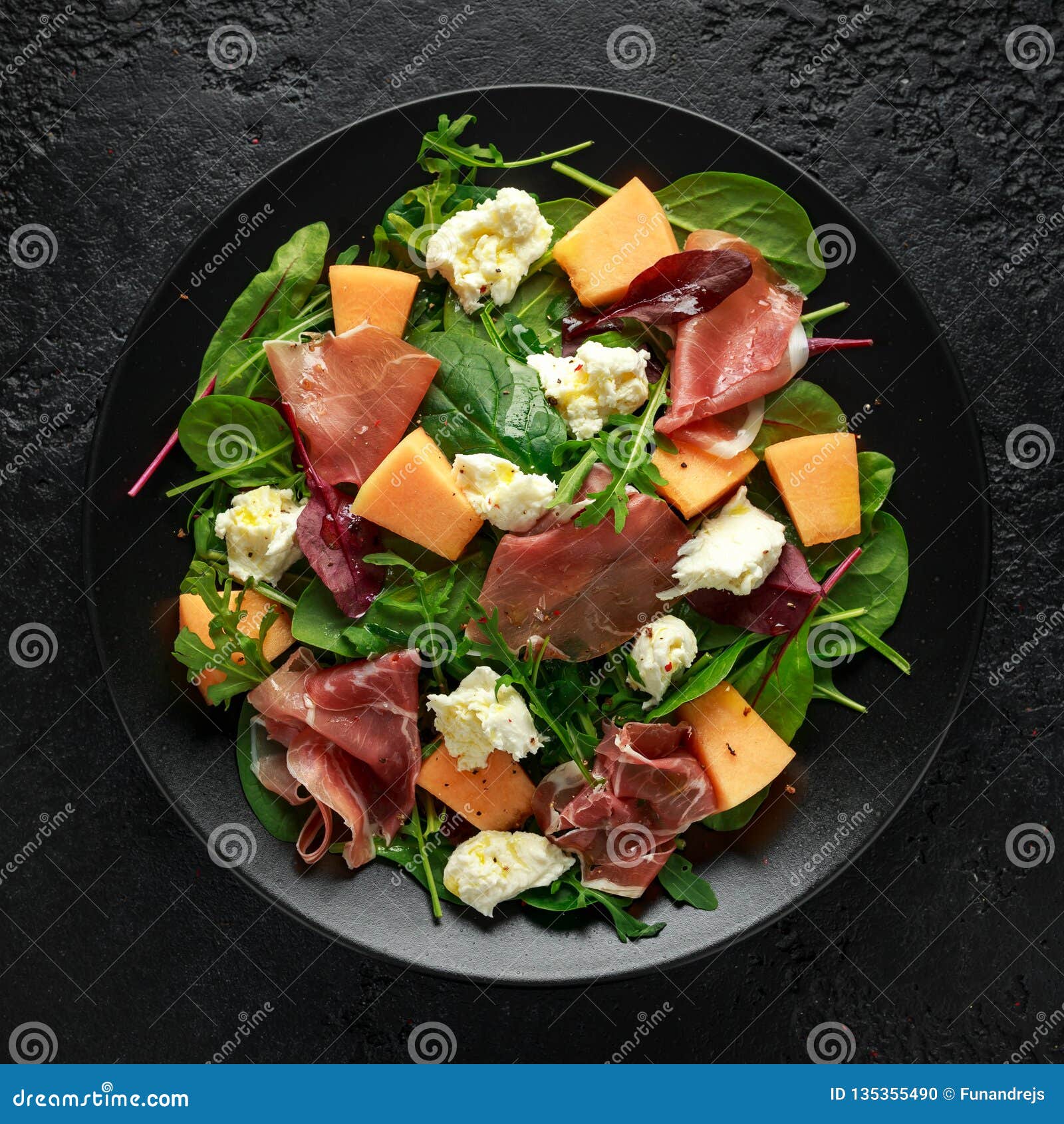 Parma Ham and Melon Salad with Mozzarella, Green Leaves Mix Stock Photo ...
