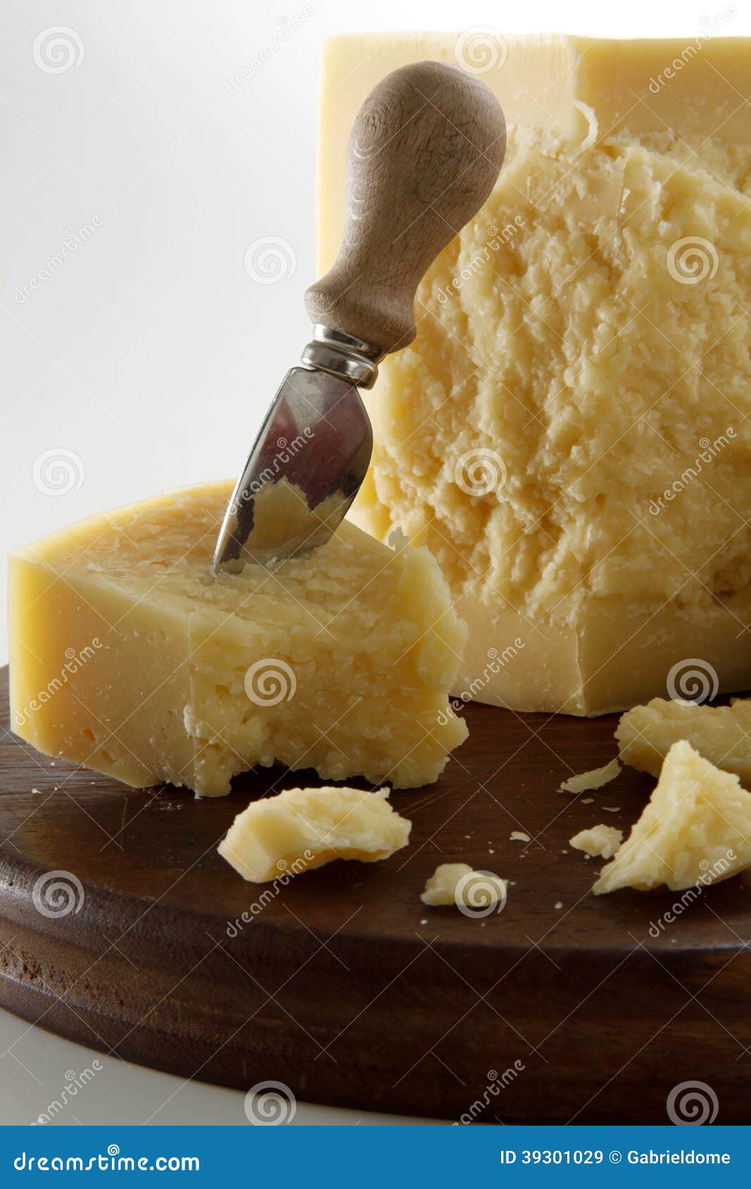 Parmesan cheese with knife stock image. Image of food - 39301029