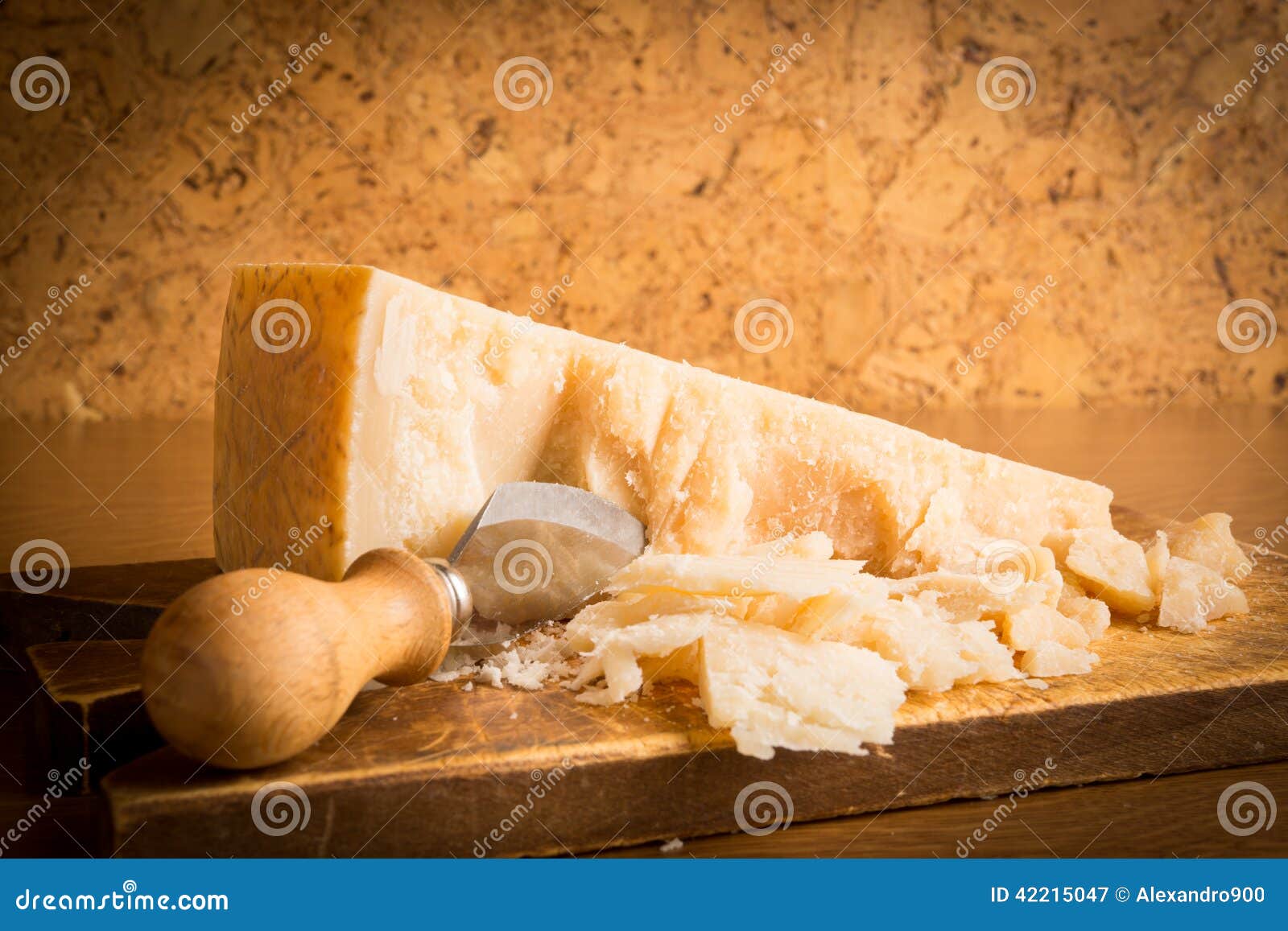 Parmesan cheese with knife stock image. Image of background - 42215047
