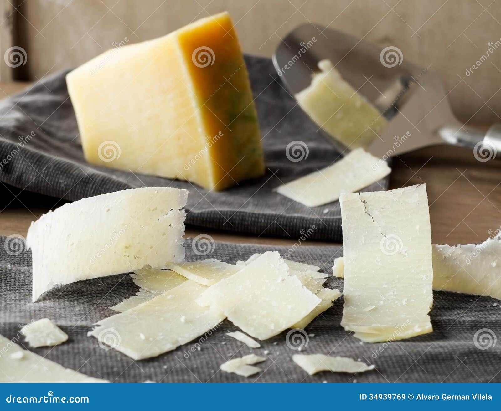Parmesan cheese slices. stock image. Image of gourmet - 34939769