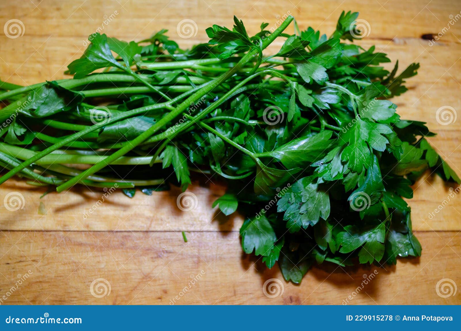 Parsley Bundle on a Wooden Cutting Board Stock Photo - Image of cookery ...