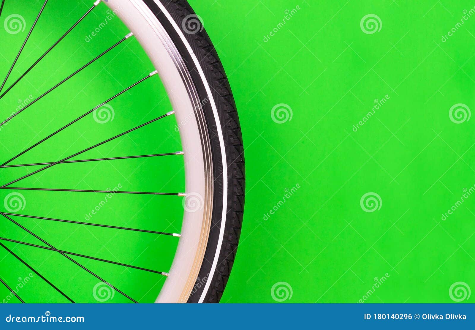 Part of a Bicycle Wheel on a Green Background. Copy Space. Stock Photo ...