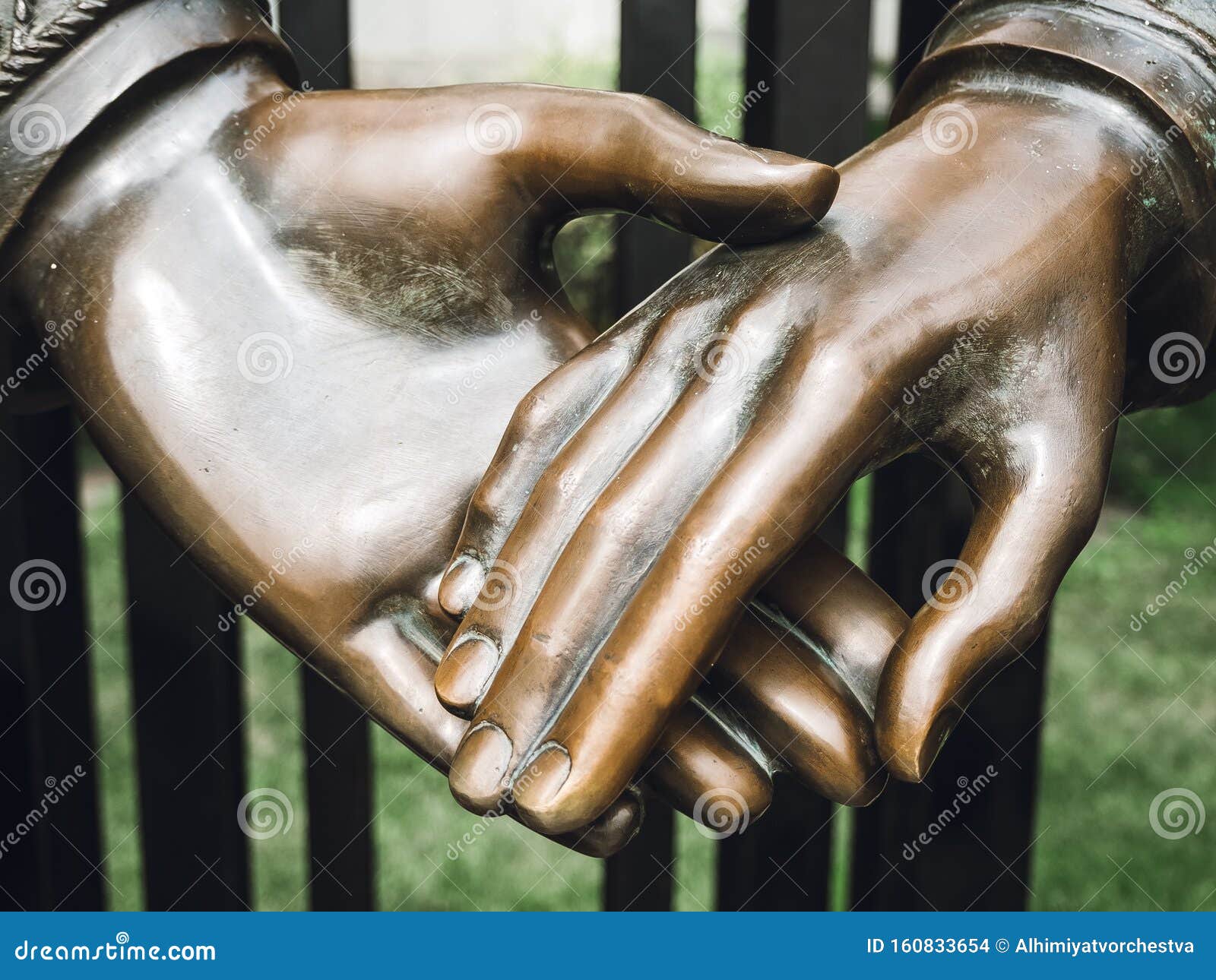 Part of a Bronze Sculpture - Hand in Hand Stock Photo - Image of trust ...