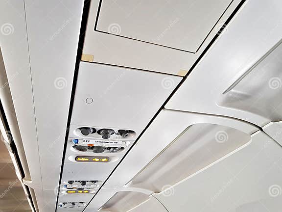 Ceiling panel in the plane stock image. Image of heat - 114044191
