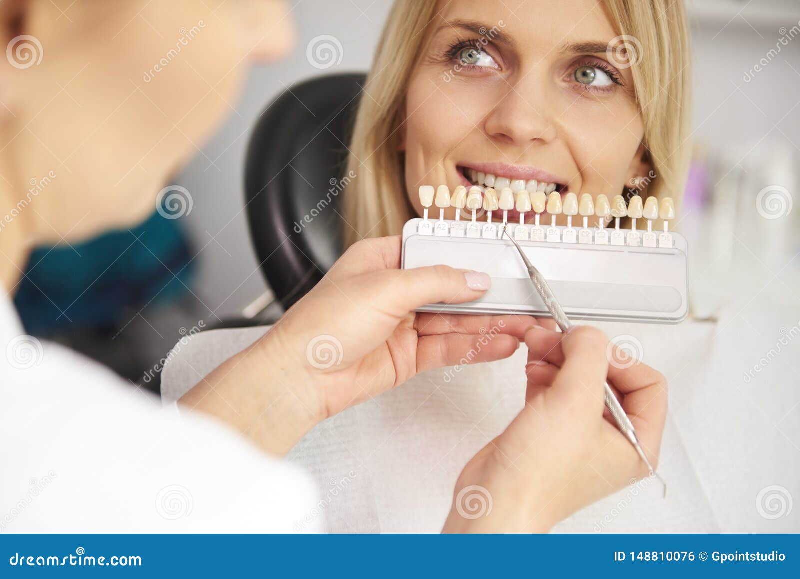 Part of Dentist Choosing Color Teeth from Palette Stock Photo - Image ... Part of Dentist Choosing Color Teeth from Palette Stock Photo - Image ...