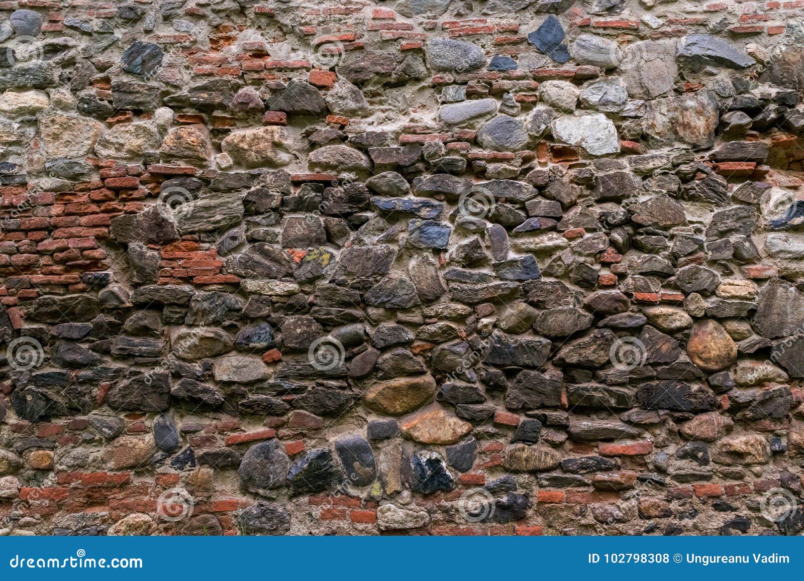 Medieval Wall Built of Stone and Bricks, Background Texture Stock Photo ...