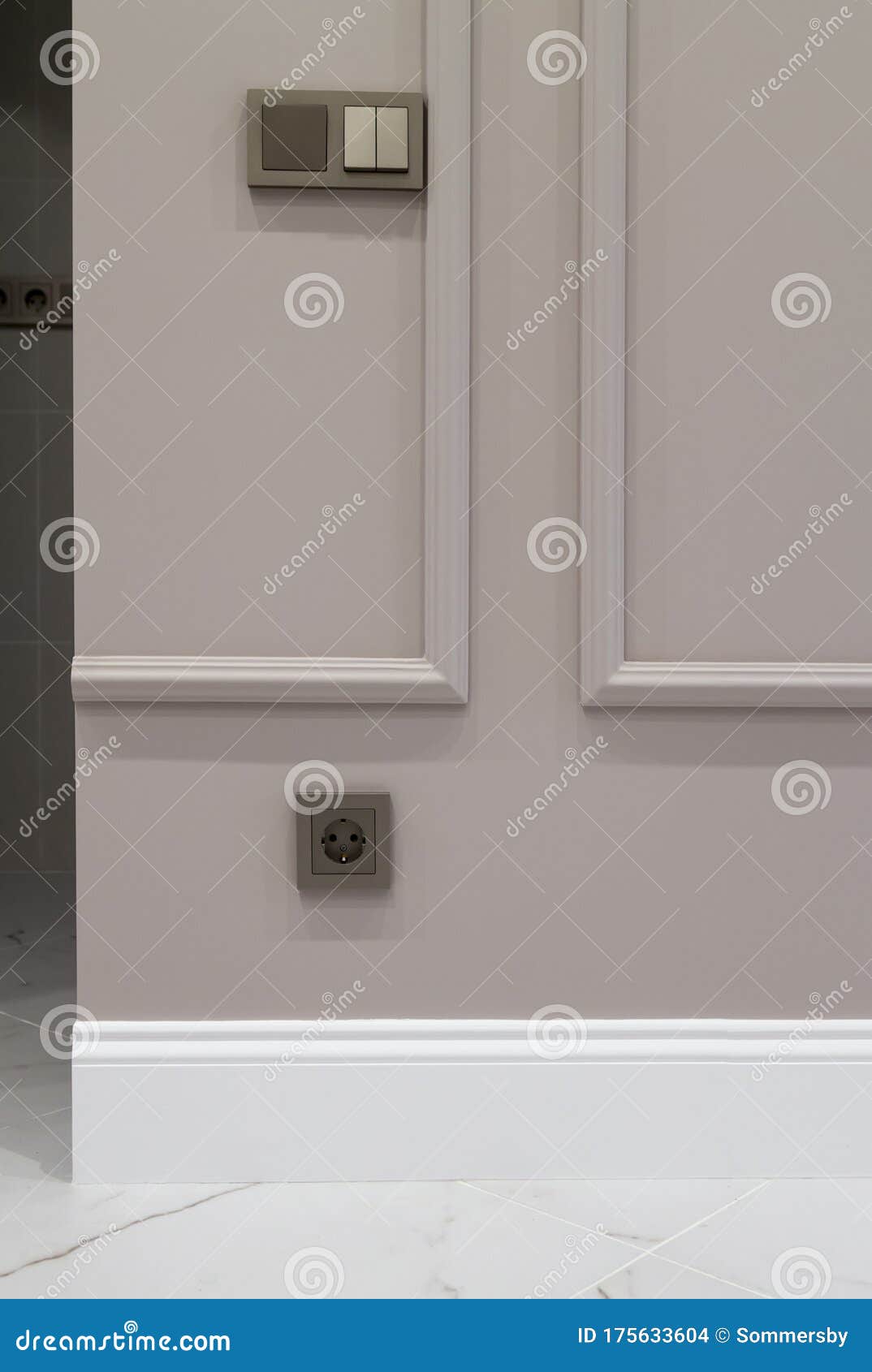 Part of the Interior with an Electrical Outlet on the Brown Wall Above ...