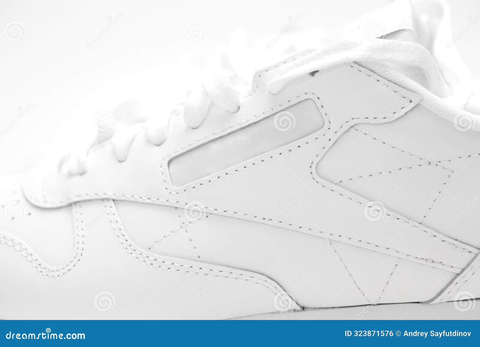 Part of New White Sneakers on a White Background. Stock Photo - Image ...